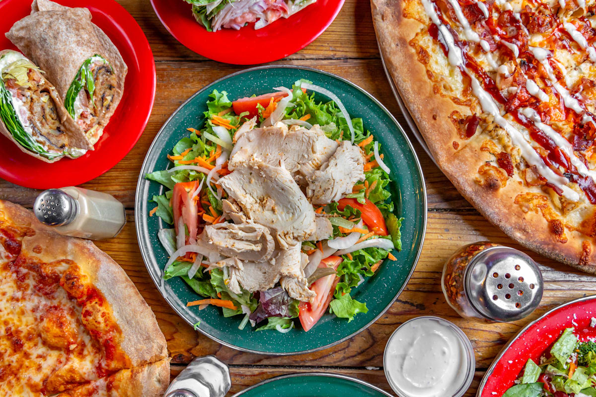 The Plum Tomato Delivery Menu | Order Online | 10 Chesterfield Rd East ...