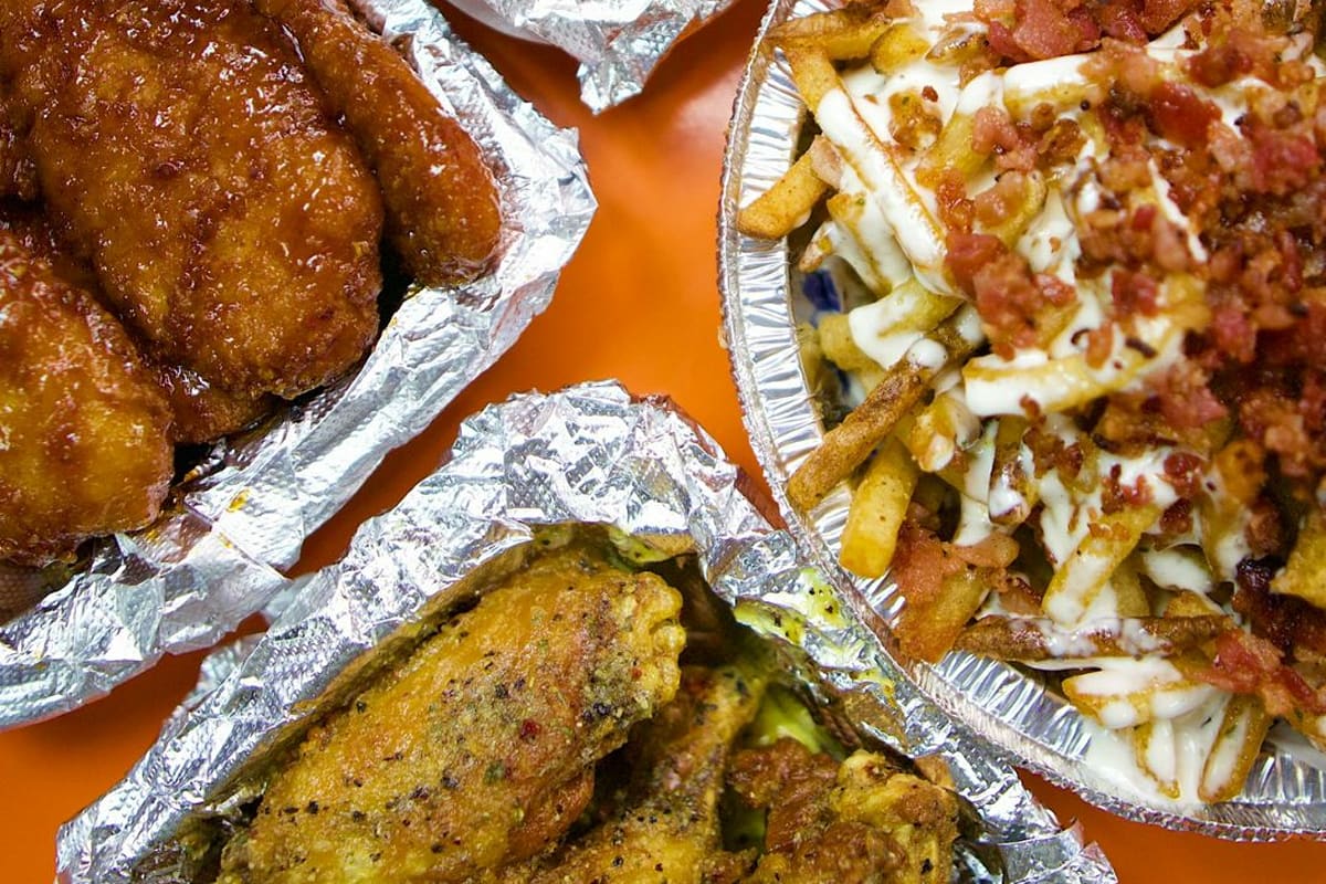 Sauced and Loaded Chicken Wings Delivery Menu | Order Online | 8024 ...